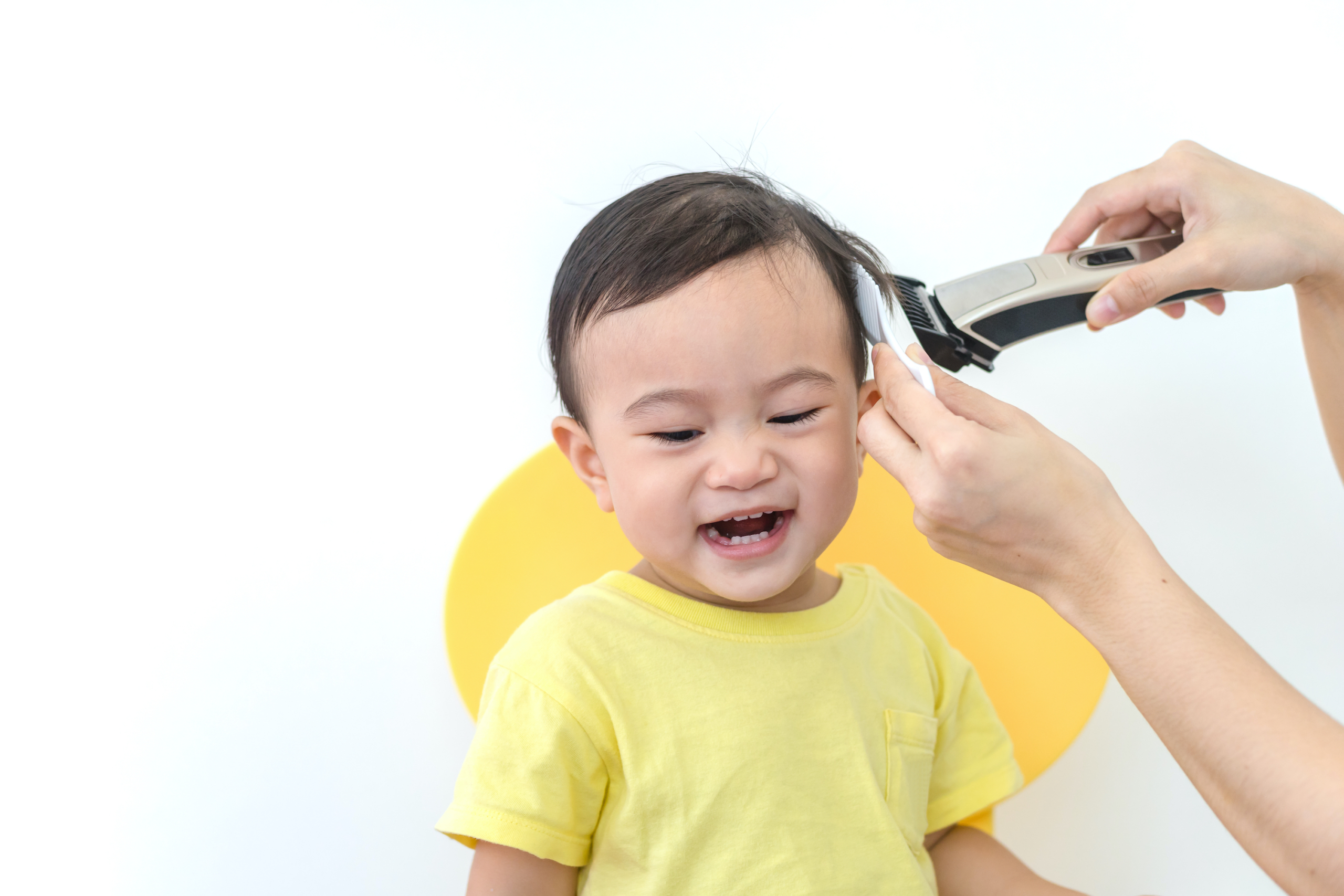 When do babies get their first haircut? | NewFolks